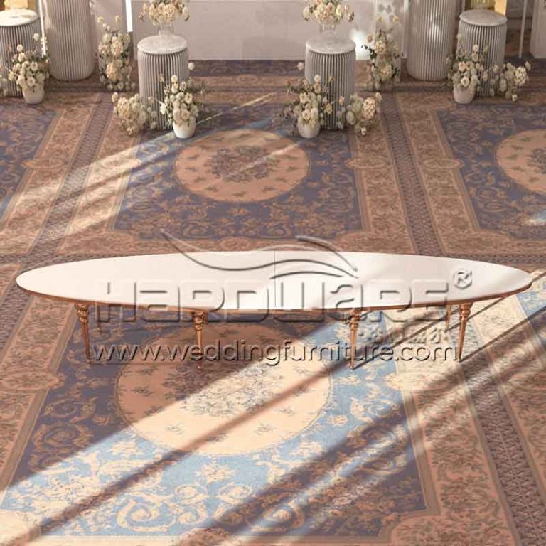 Oval dining table with rose gold 3 ball legs