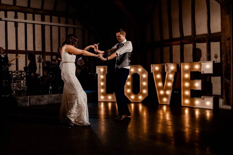 The Enchanting Glow of Light Letters at Weddings